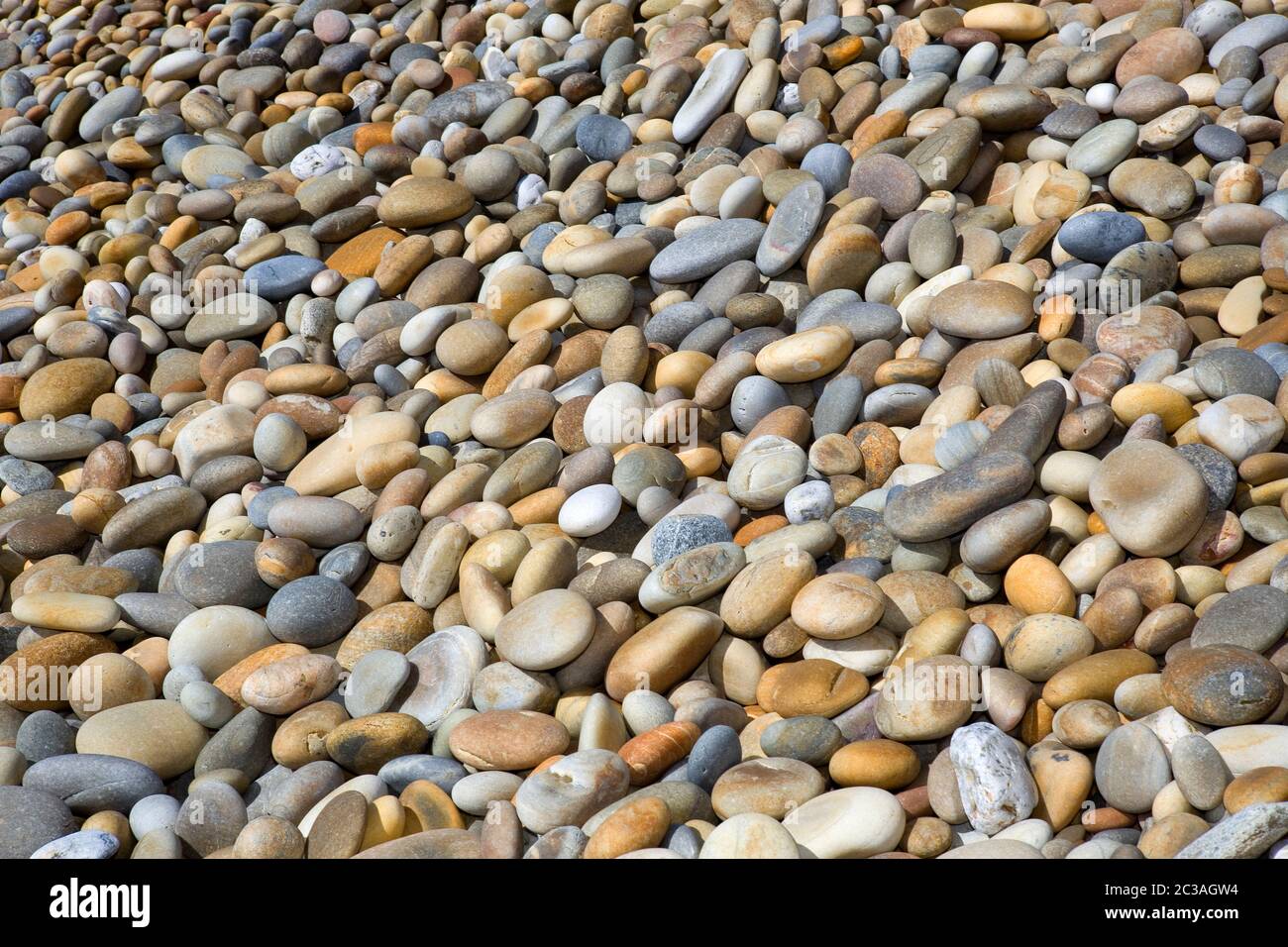 colorful pebble stone background, at the beach Stock Photo - Alamy
