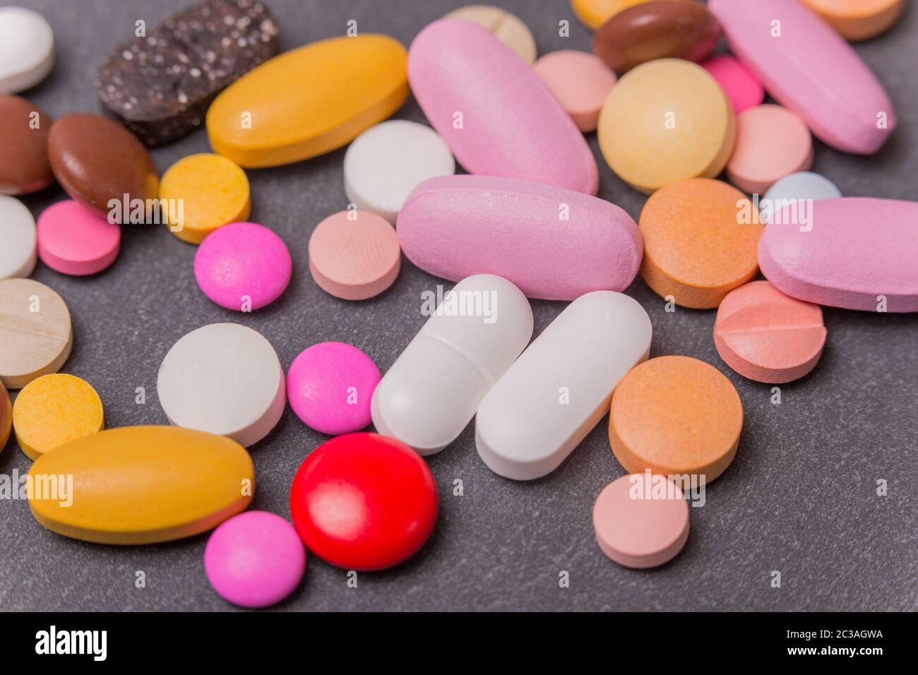 different Tablets pills capsule heap mix therapy drugs Stock Photo - Alamy