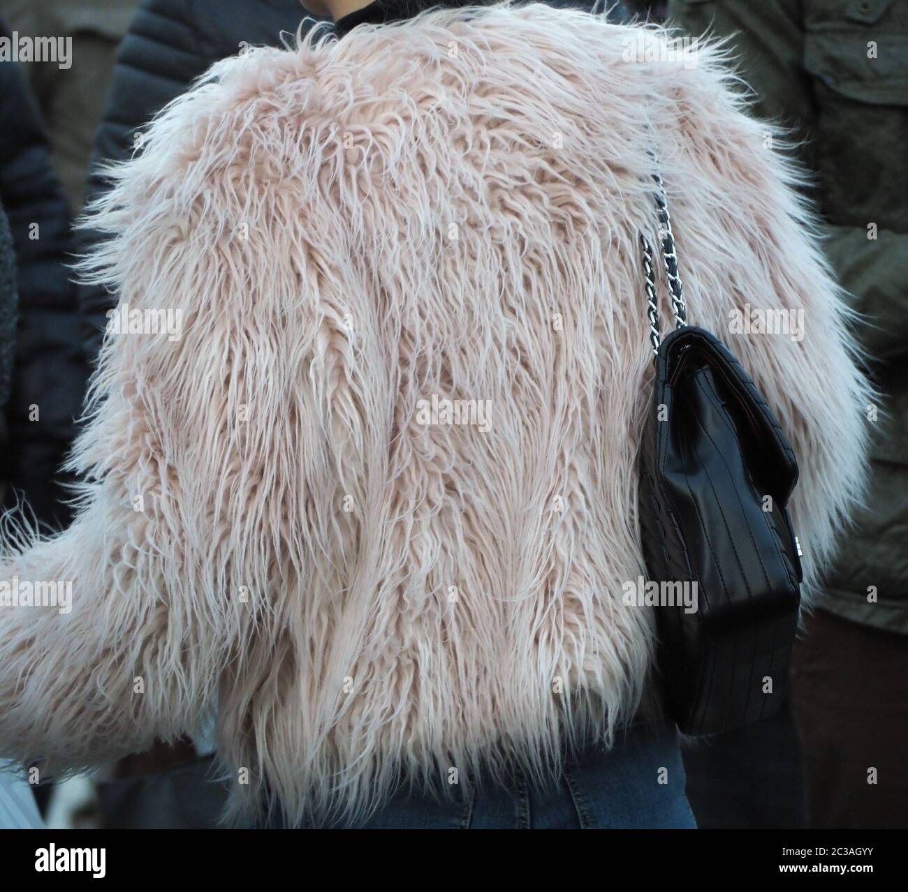 fluffy white wool jacket as woman clothing Stock Photo - Alamy