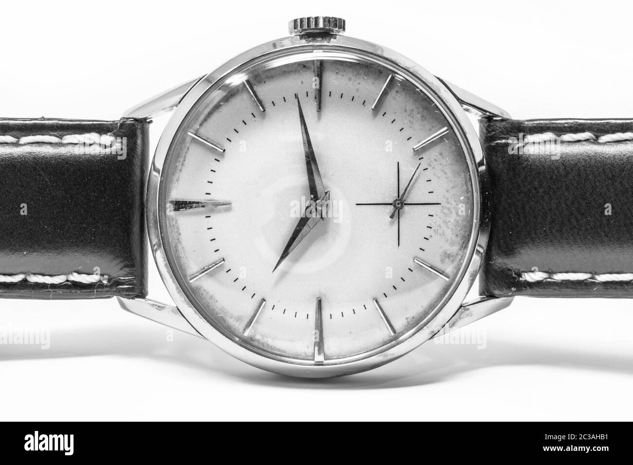 An old gold mechanical wristwatch with manual winding. Antique watch ...