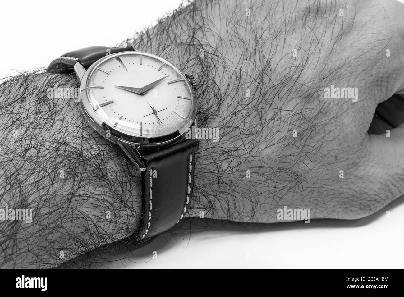 An old gold mechanical wristwatch with manual winding. Antique watch ...