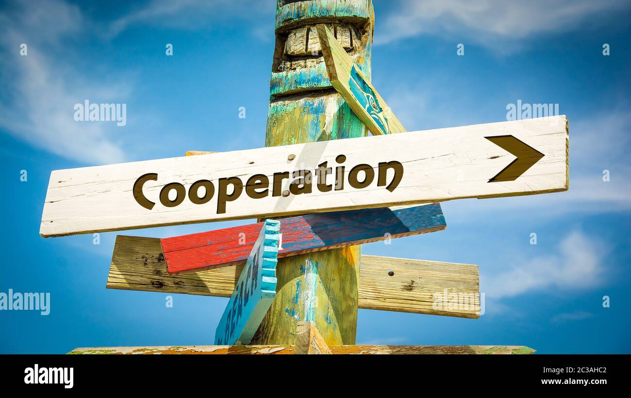 Street Sign to Cooperation Stock Photo - Alamy