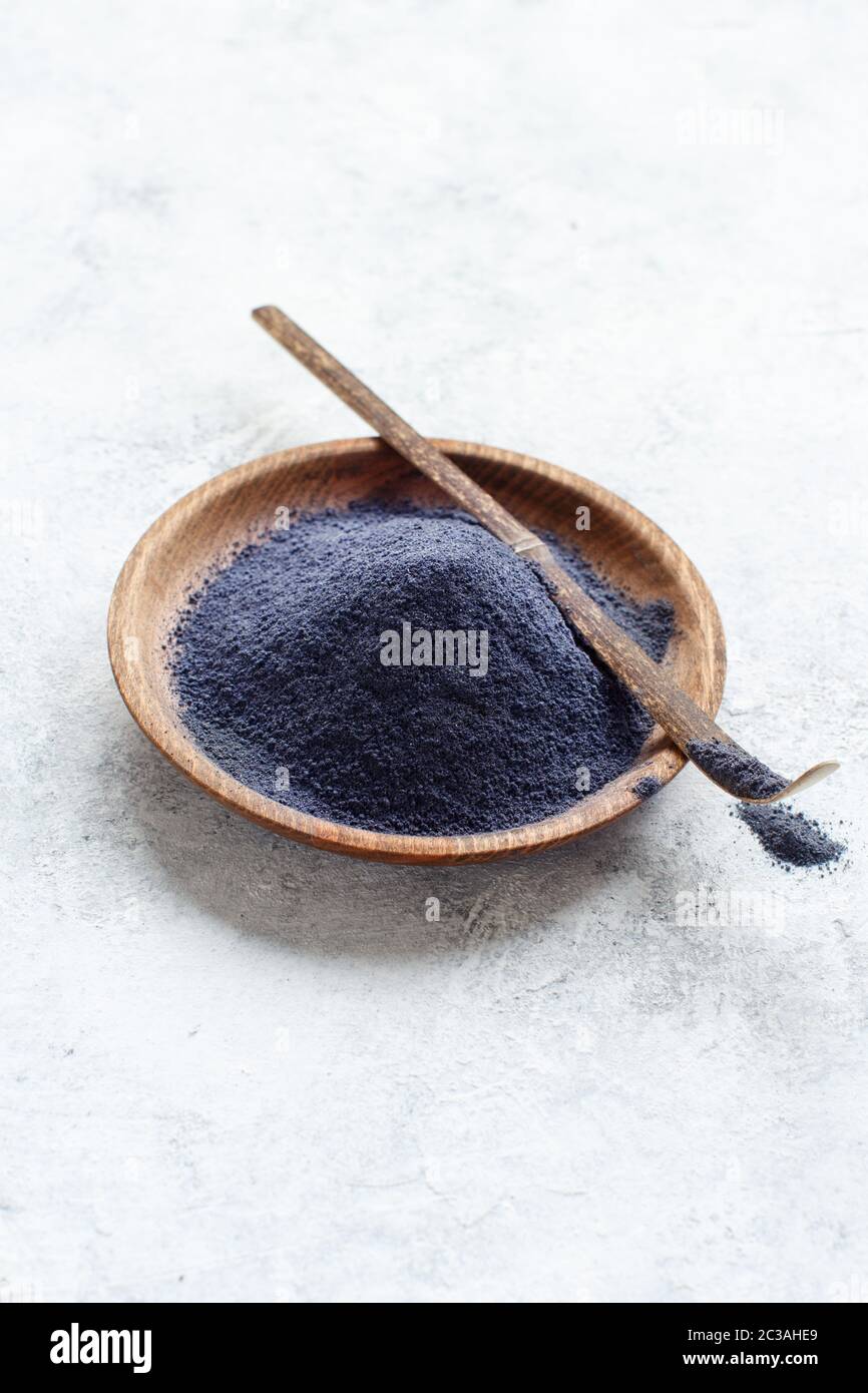 Butterfly pea blue matcha powder on a plate close up Stock Photo - Alamy