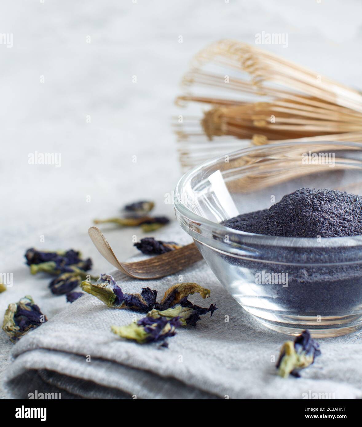 Butterfly pea blue matcha powder with wrisk and dried flowers Stock ...