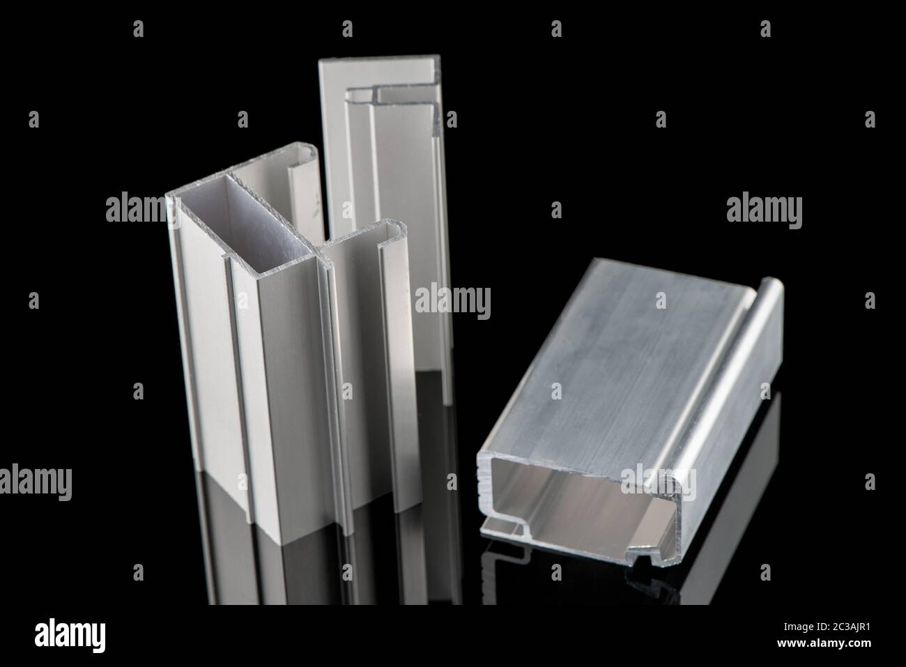 Aluminum profile sample isolated on black background Stock Photo - Alamy