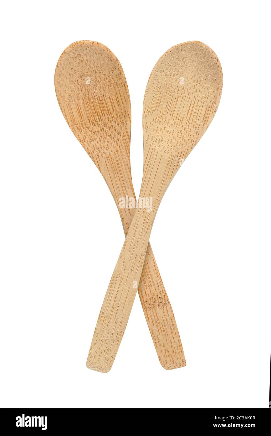 Two crossed bamboo wood small spoons isolated on white background Stock ...