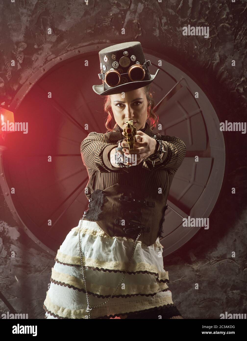 Steampunk woman with mechanical gun Stock Photo - Alamy