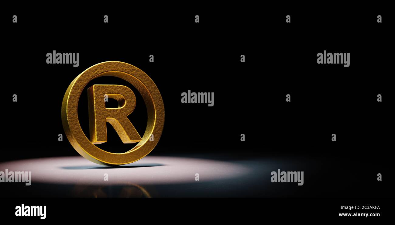 Golden Trademark Symbol Shape Spotlighted on Black Background with Copy ...