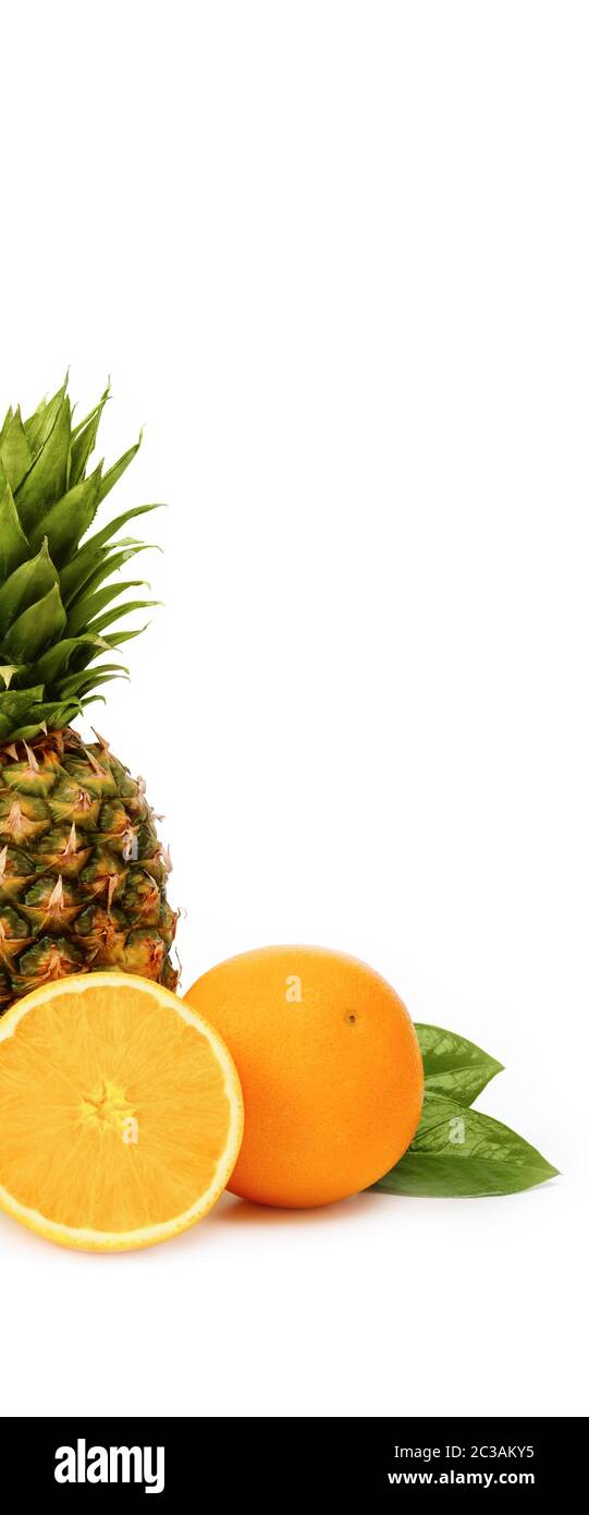 Pineapple and orange isolated on white background Stock Photo - Alamy