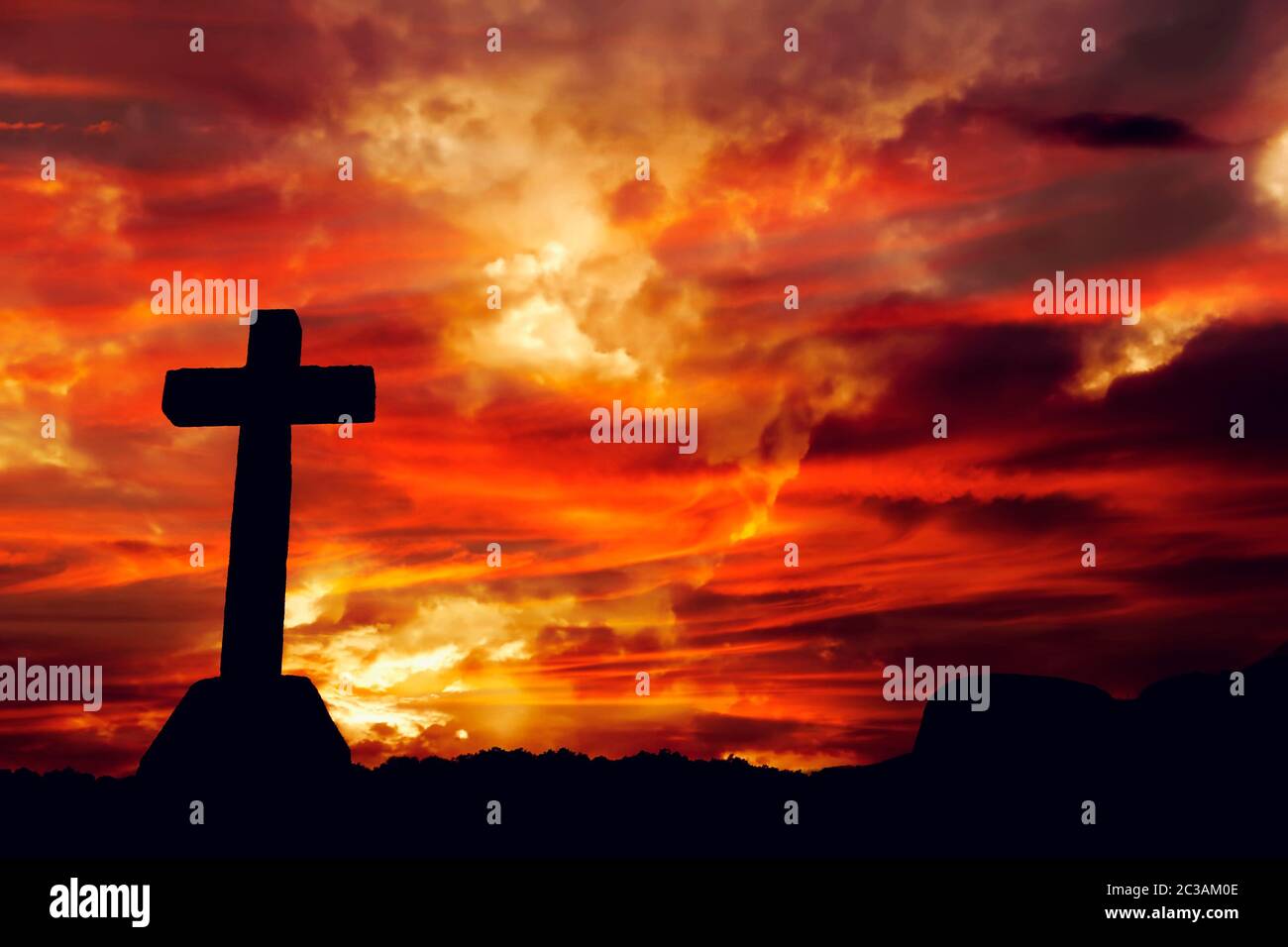 cross silhouette and the clouds at sunset Stock Photo - Alamy