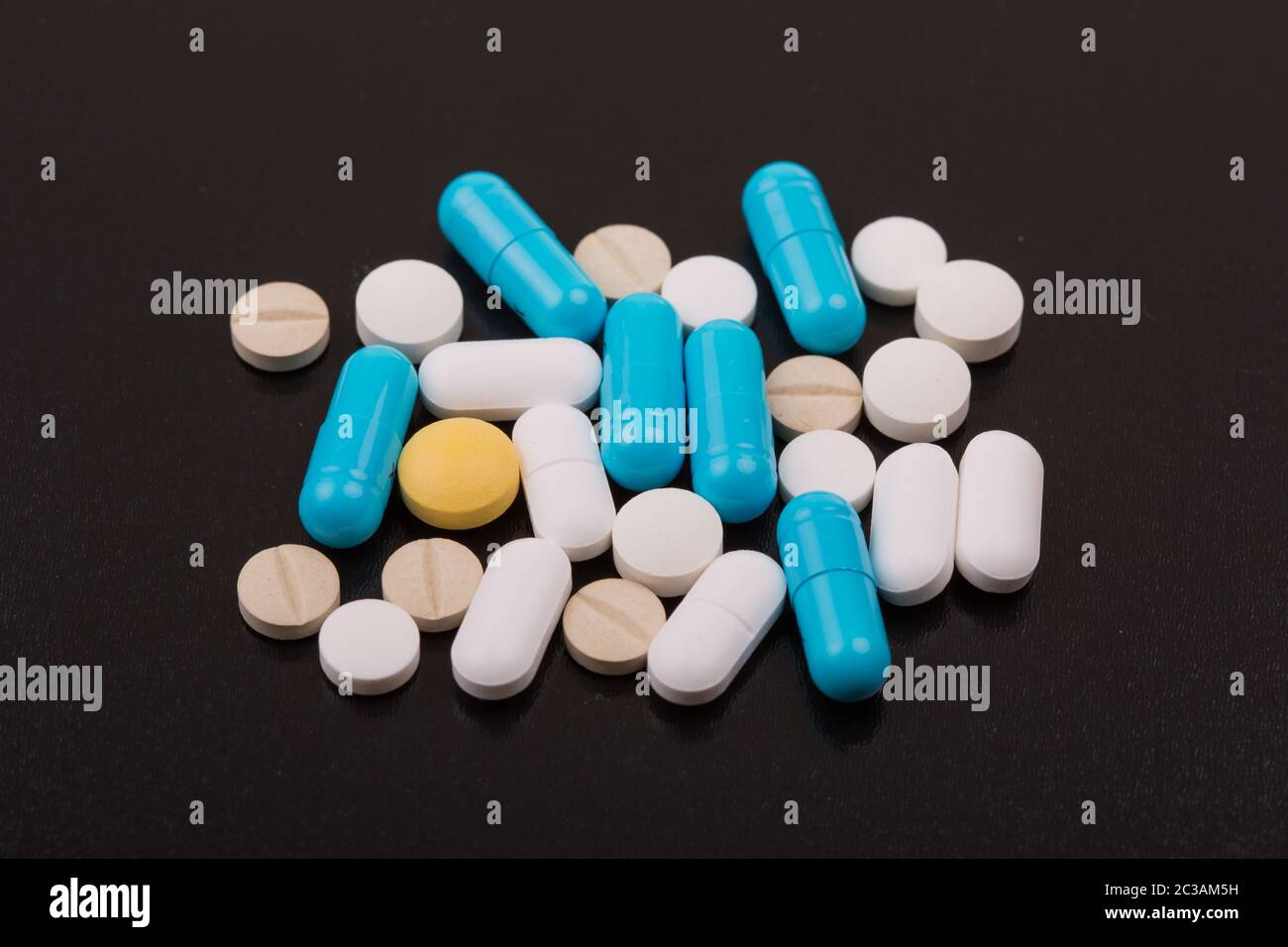 different tablets pills capsule heap mix therapy drugs Stock Photo - Alamy