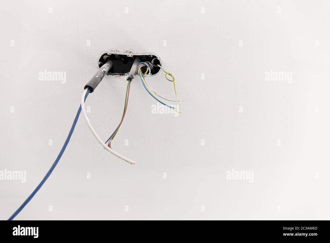 Electrical wiring concept background. Electrical box and cables on ...