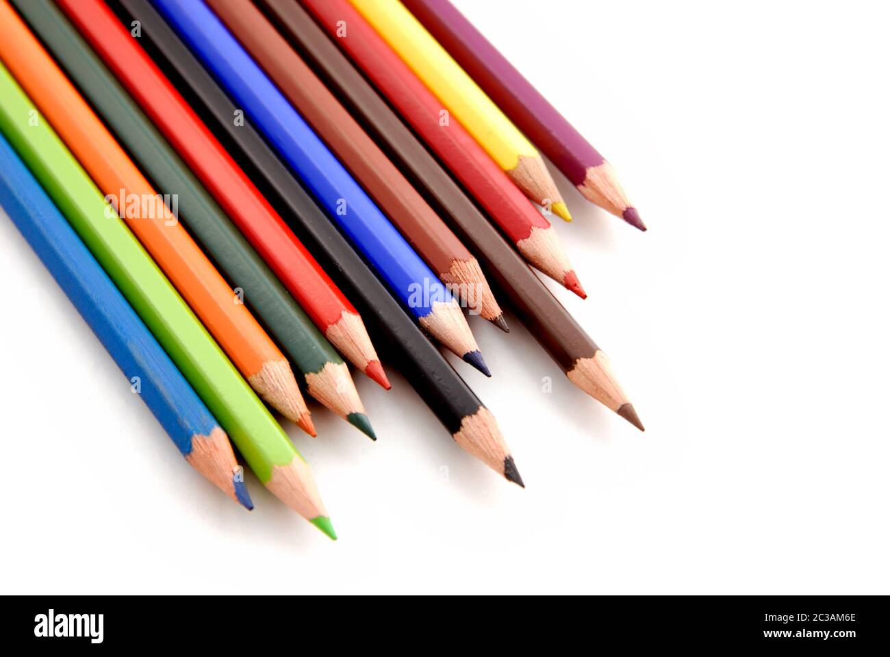 color pencils aligned and isolated on white Stock Photo - Alamy