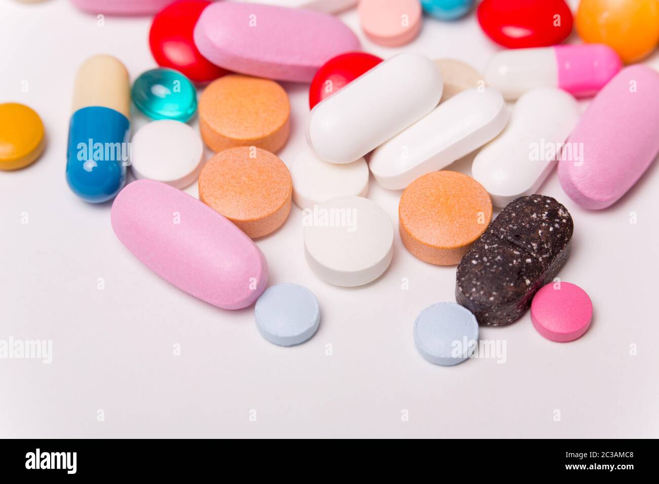 different Tablets pills capsule heap mix therapy drugs Stock Photo - Alamy