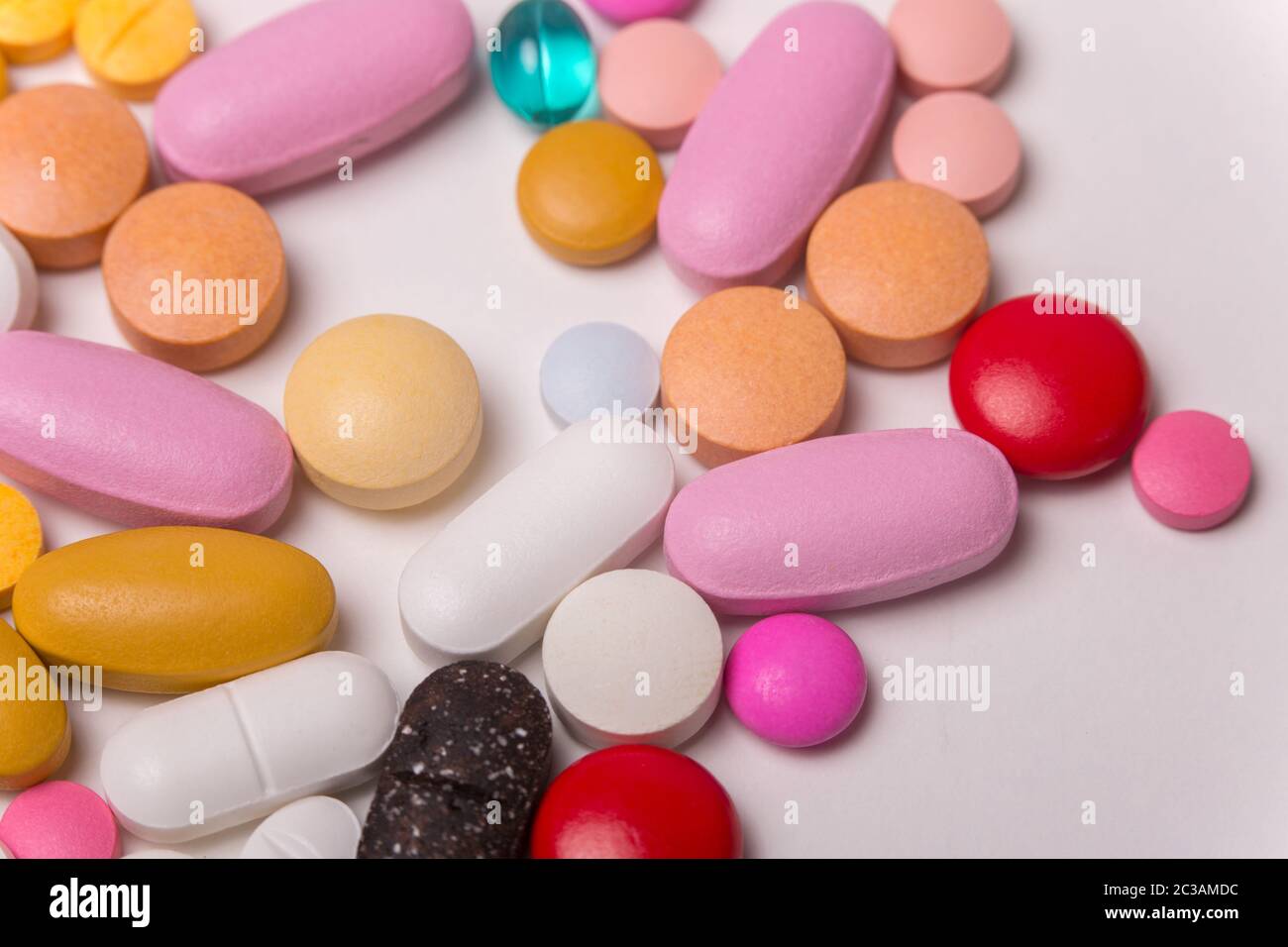 different Tablets pills capsule heap mix therapy drugs Stock Photo - Alamy