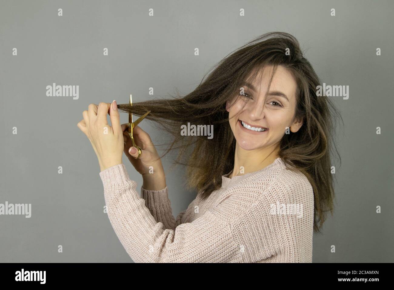 Trim hair, separated dry ends, hair care problems concept. Closeup ...