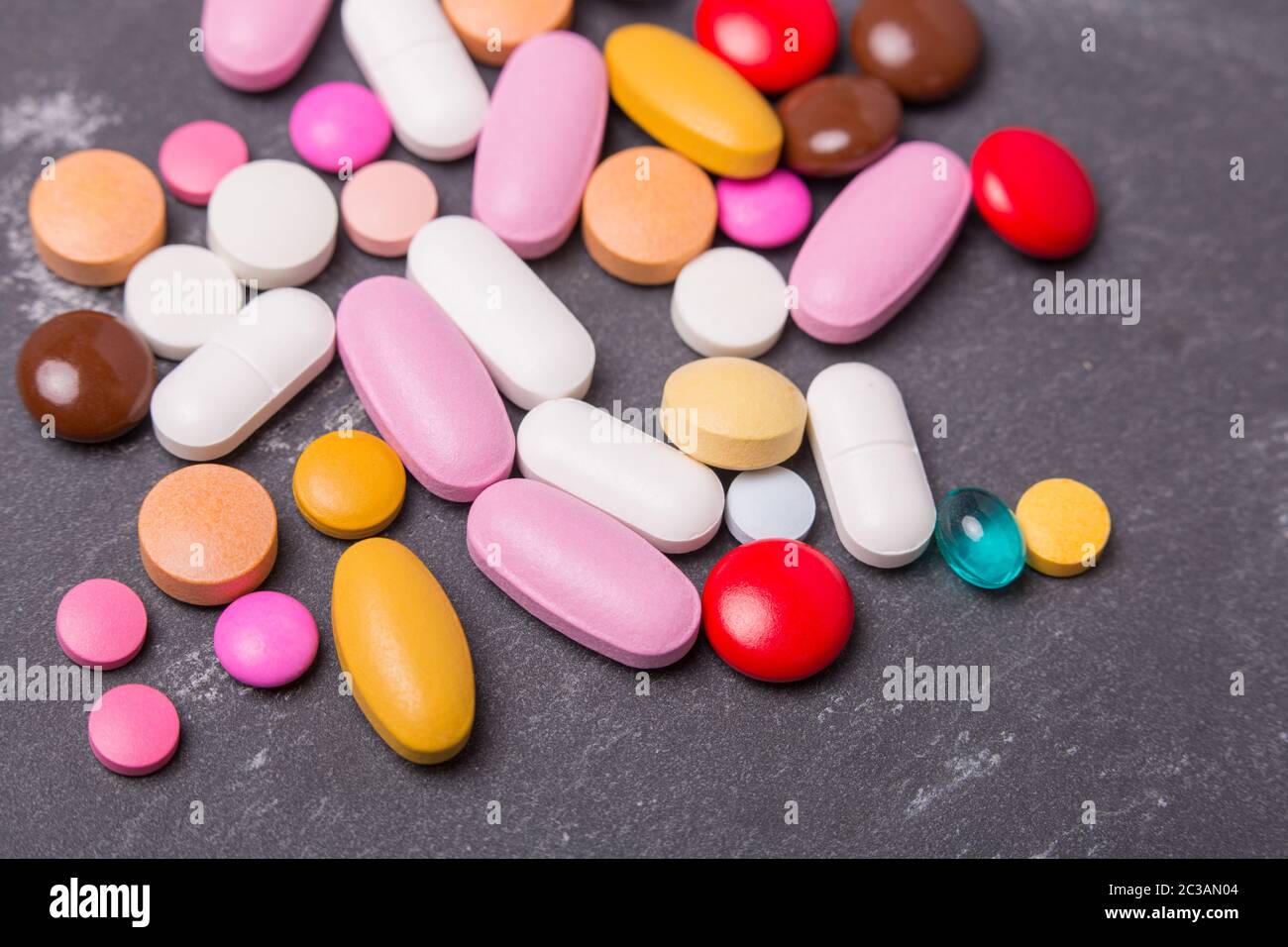different tablets pills capsule heap mix therapy drugs Stock Photo - Alamy