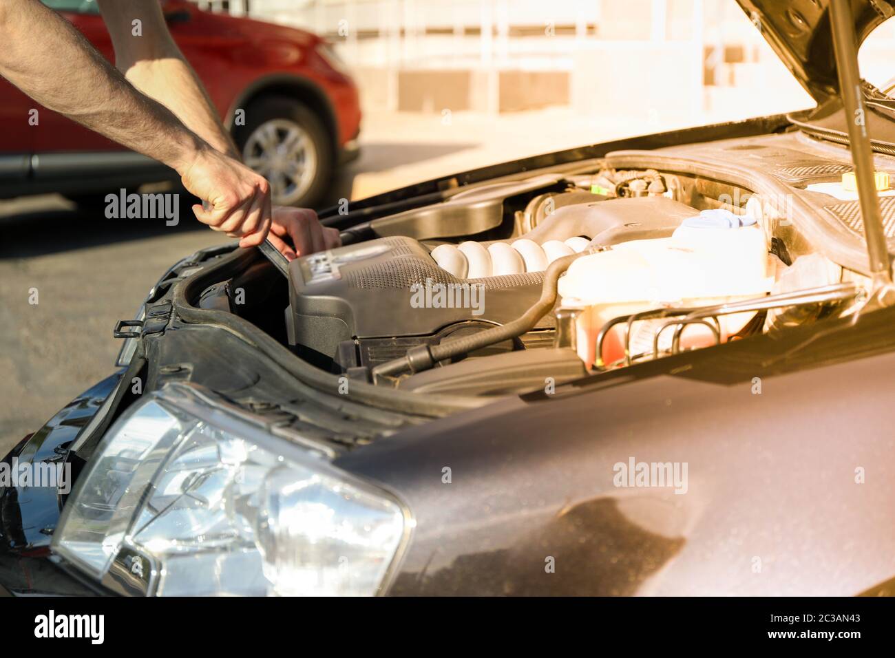 Man fixing his car hi-res stock photography and images - Alamy