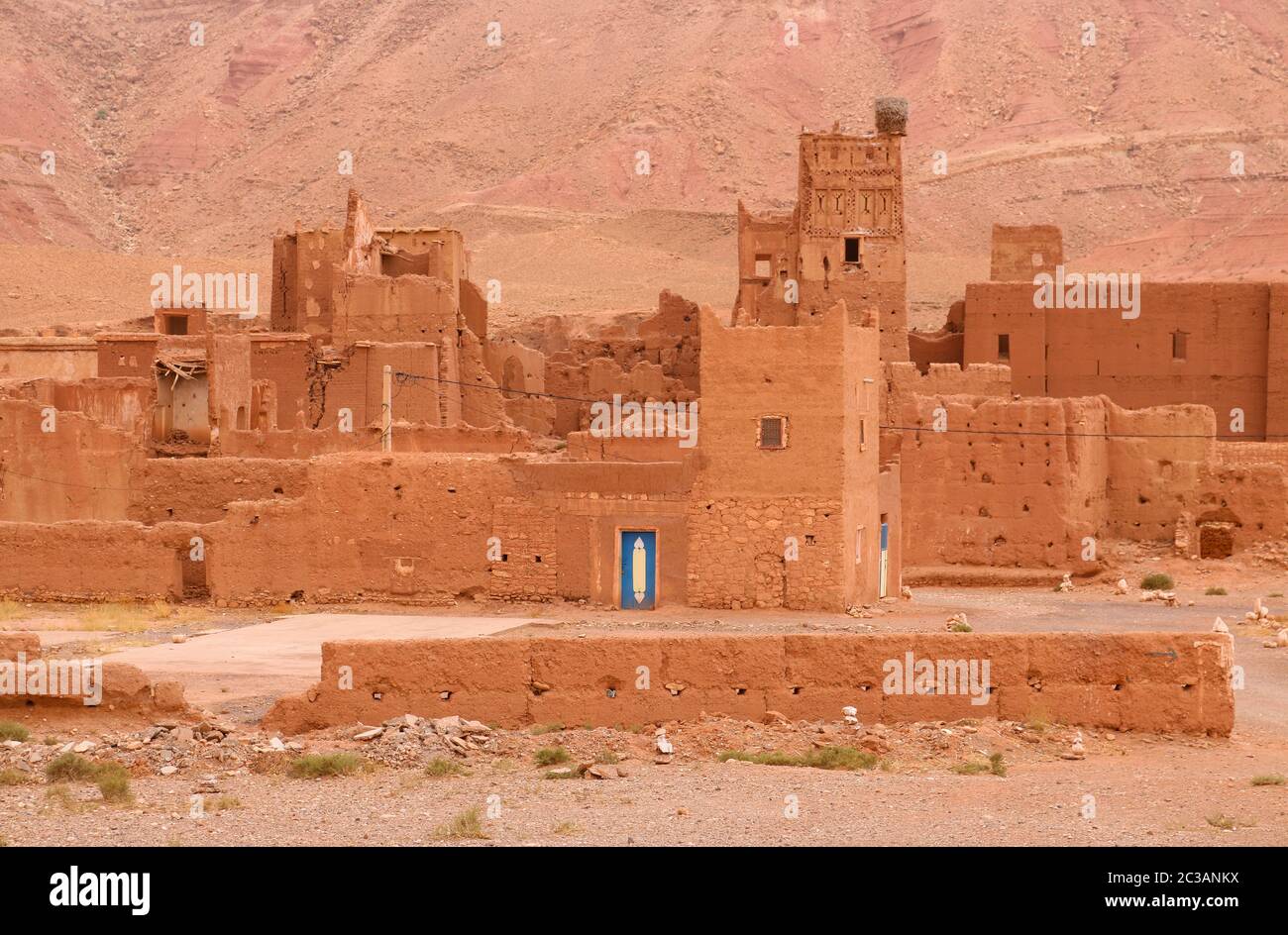 Beautiful old clay building called a kasbah in desert of Morocco, North ...