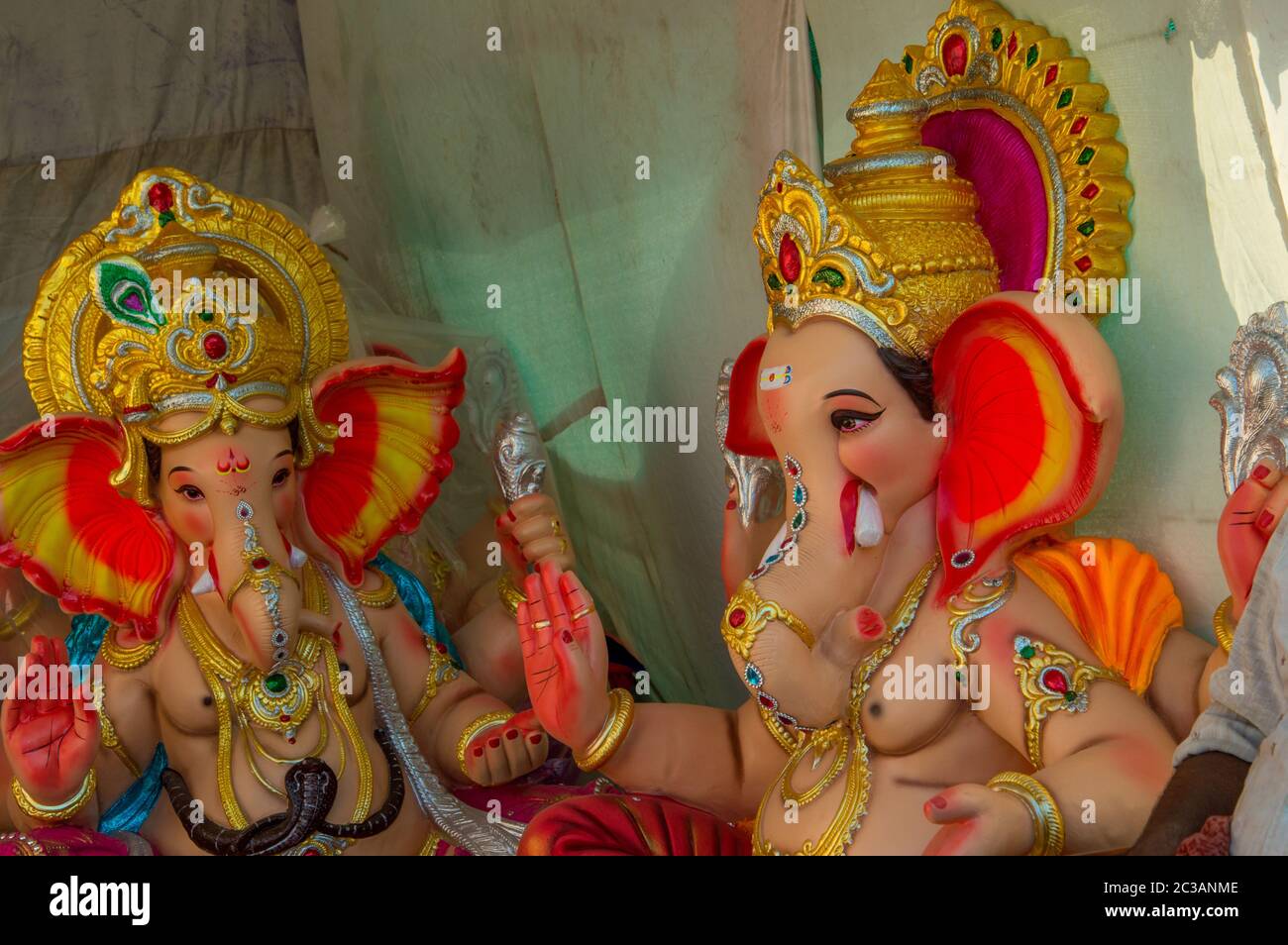 Statue of Hindu God Ganesha. close up of Ganesha Idol at an artist's ...