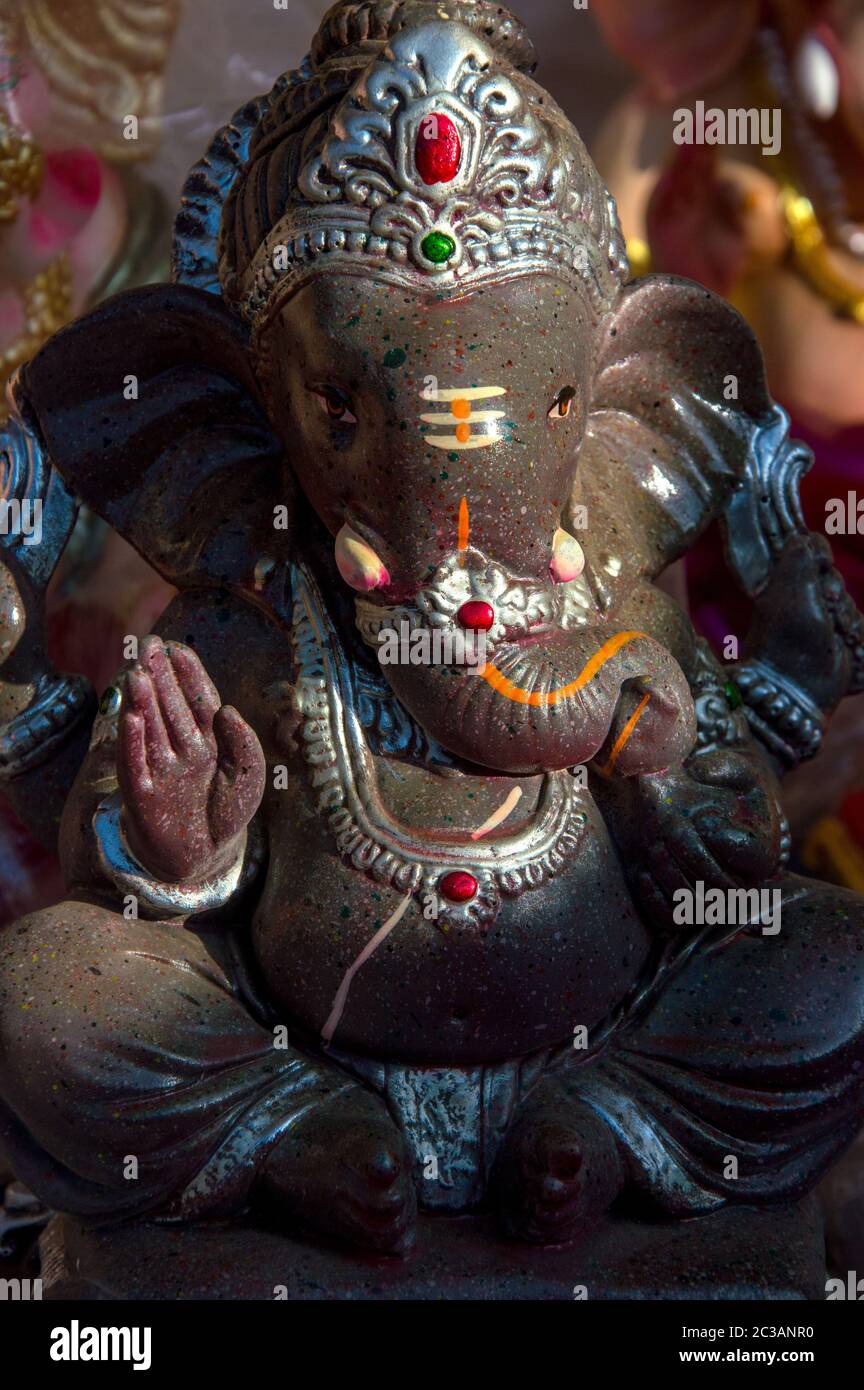 Statue of Hindu God Ganesha. close up of Ganesha Idol at an artist's ...