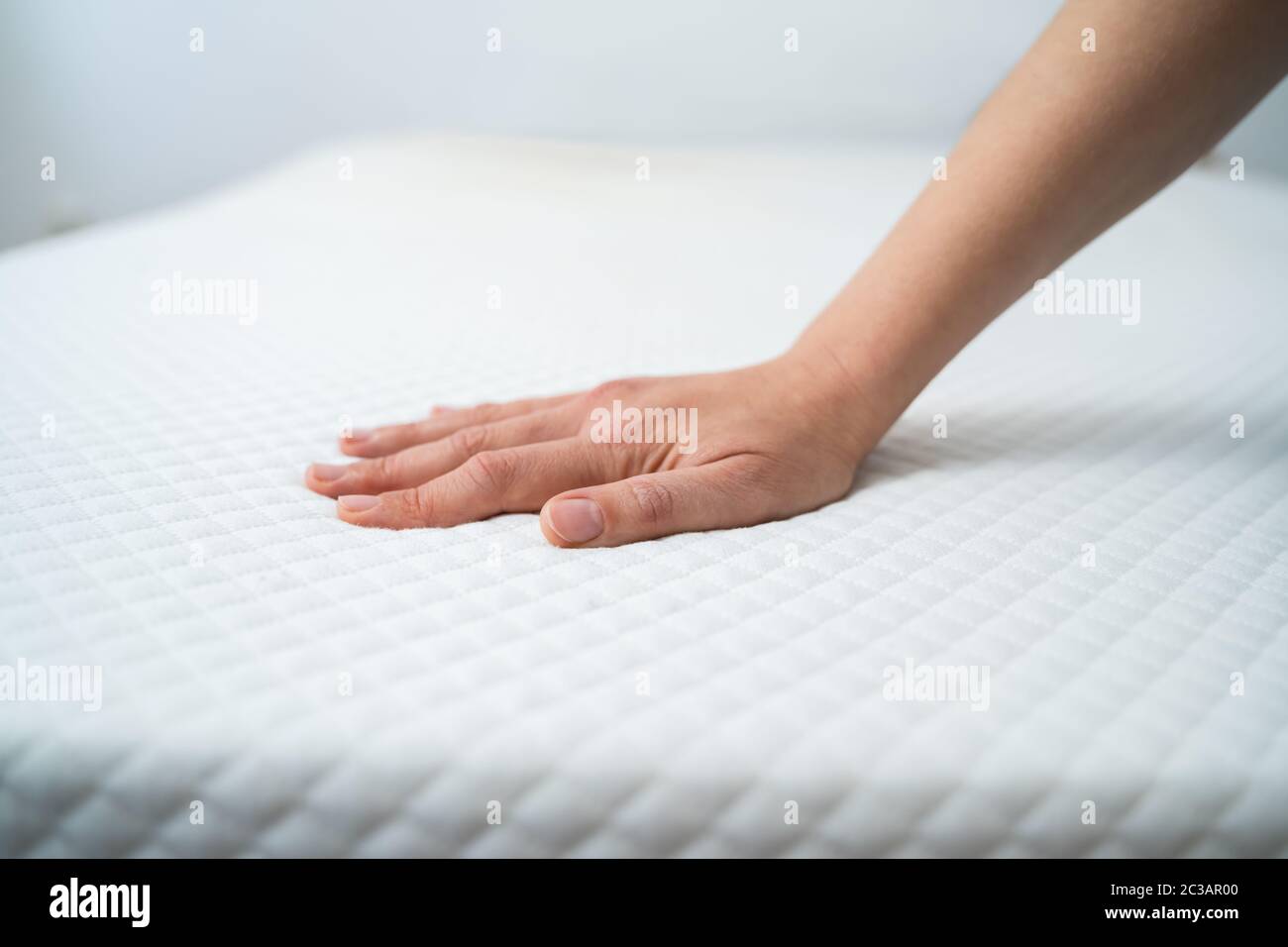 Hand Testing Orthopedic Memory Foam Core Mattress Stock Photo - Alamy