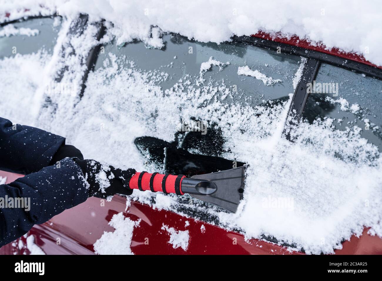 Cleaning car from snow hi-res stock photography and images - Alamy