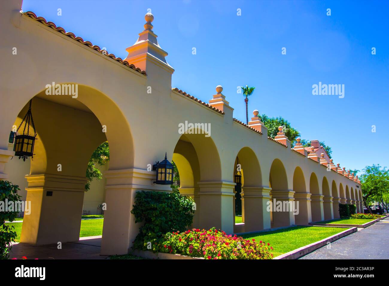 Walkway Surrounded By Spanish Arches & Columns Stock Photo - Alamy