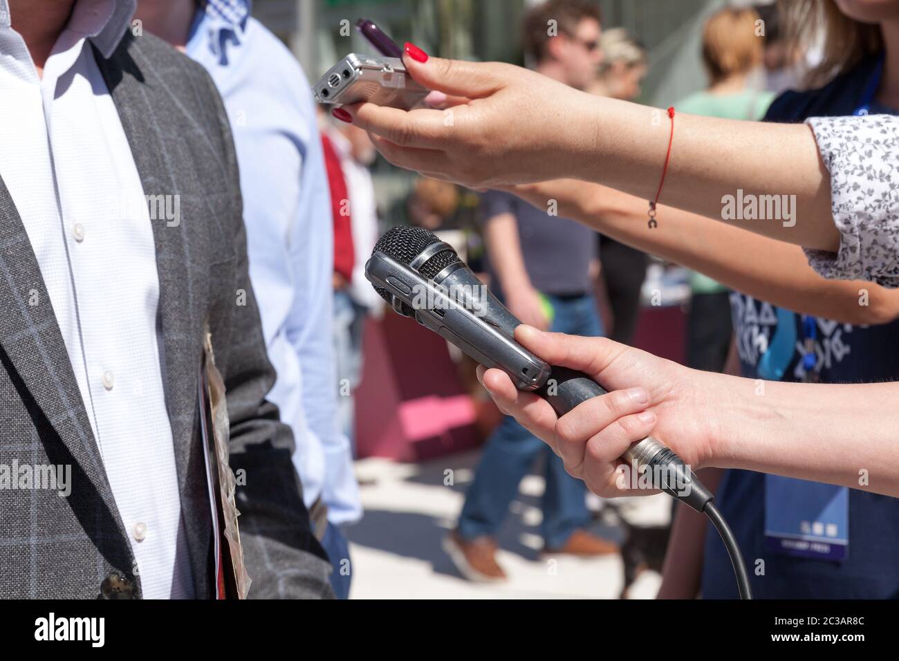 Press interview. Broadcast journalism Stock Photo - Alamy
