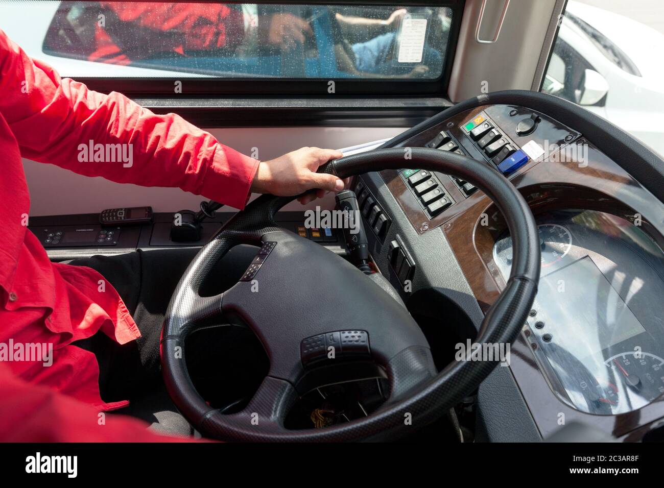 Bus driver at work Stock Photo - Alamy