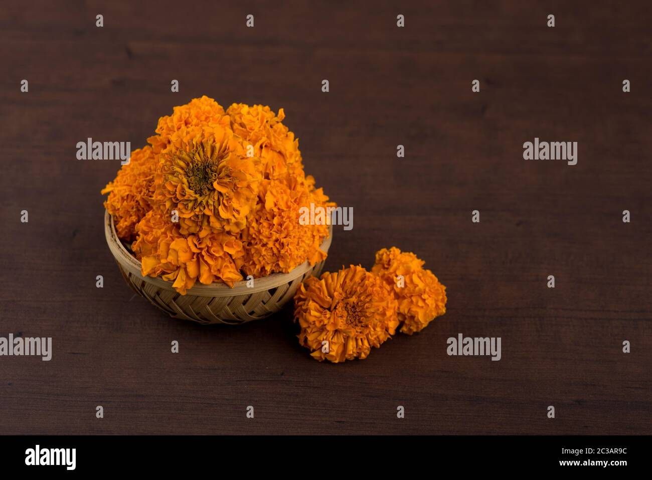 Marigold (Zendu Flowers) flowers in a bamboo basket Stock Photo - Alamy