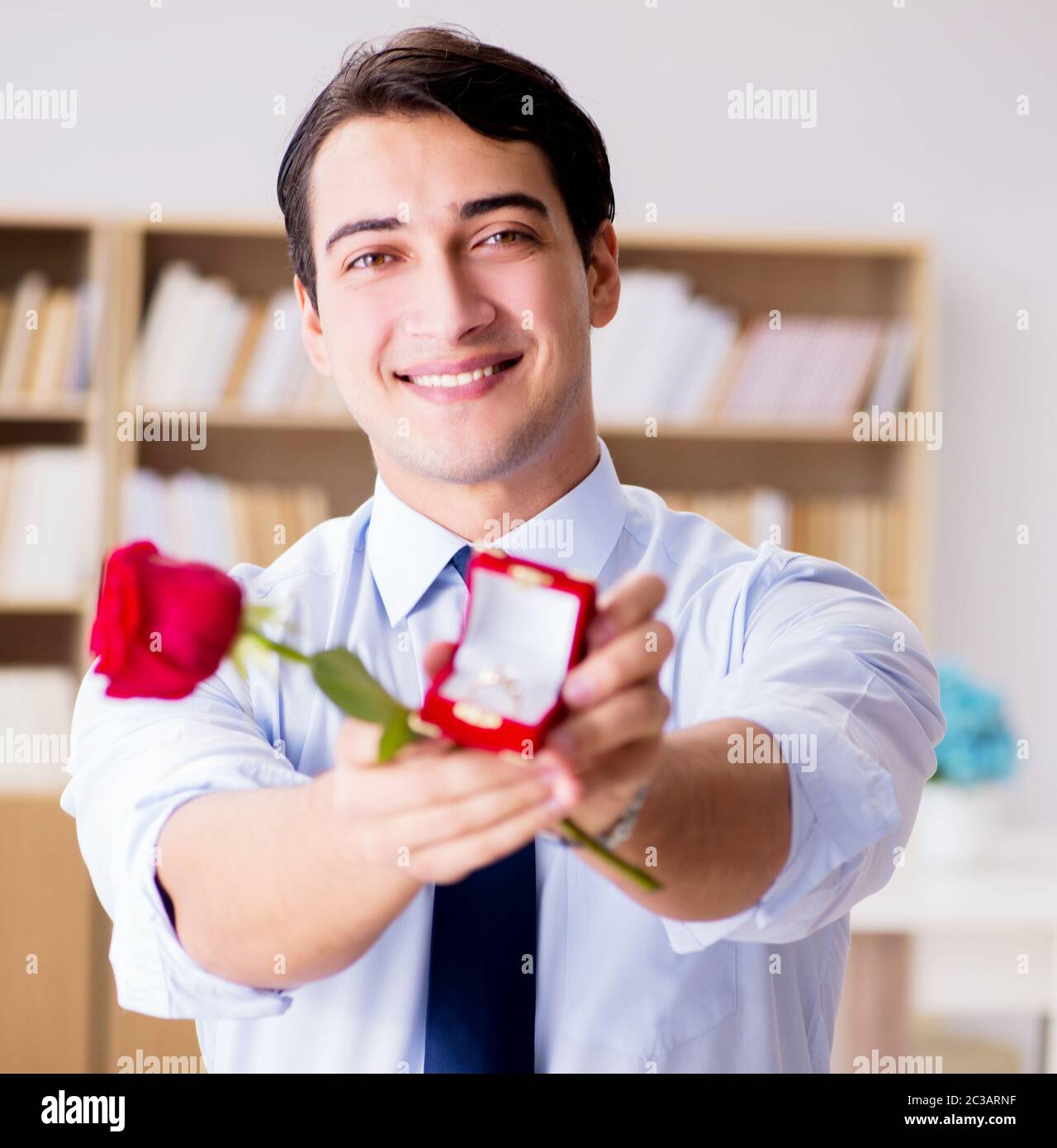 Romantic concept with man making marriage proposal Stock Photo - Alamy