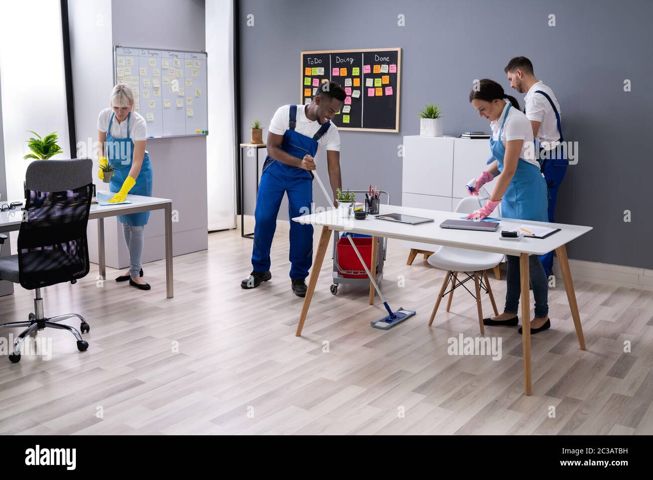 Group janitors cleaning equipment hi-res stock photography and images ...