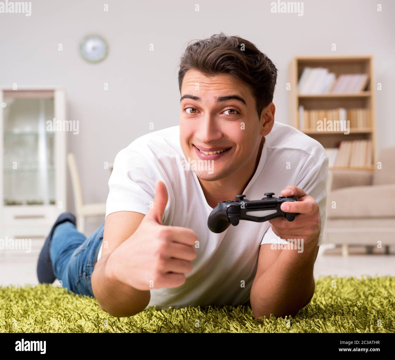 Man addicted to computer games Stock Photo - Alamy