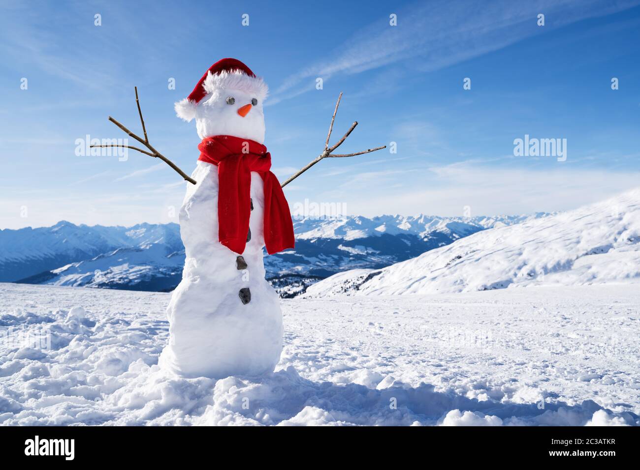 Low Angle View Of An Incomplete Snowman With Hat And Scarf On Snowy ...