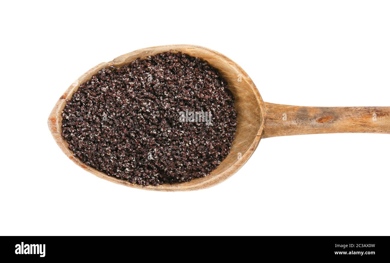 spoon of ground poppy seeds on white background Stock Photo - Alamy