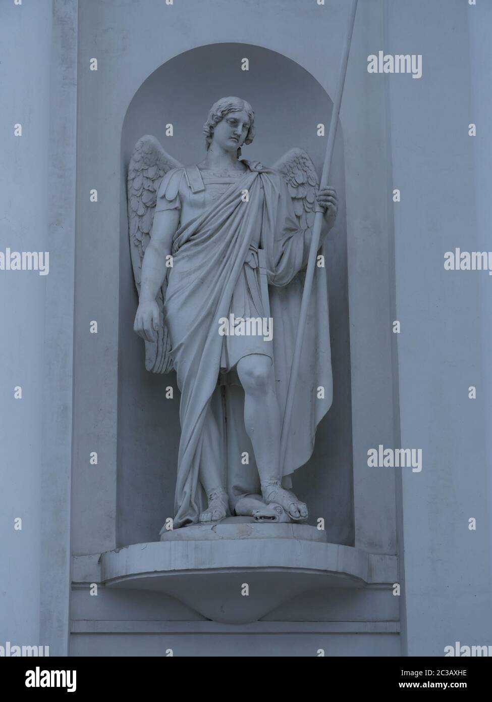 Statue of Archangel Michael with a spear striking a snake Stock Photo ...