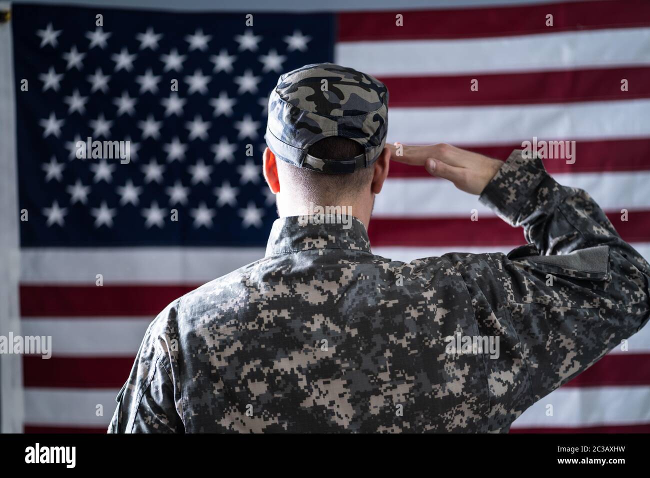 Young security guard saluting hi-res stock photography and images - Alamy