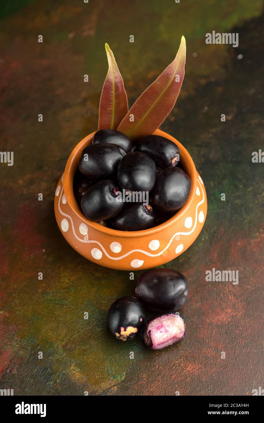 Jambolan plum or jambul or Jamun fruit, Java plum (Syzygium cumini) on ...