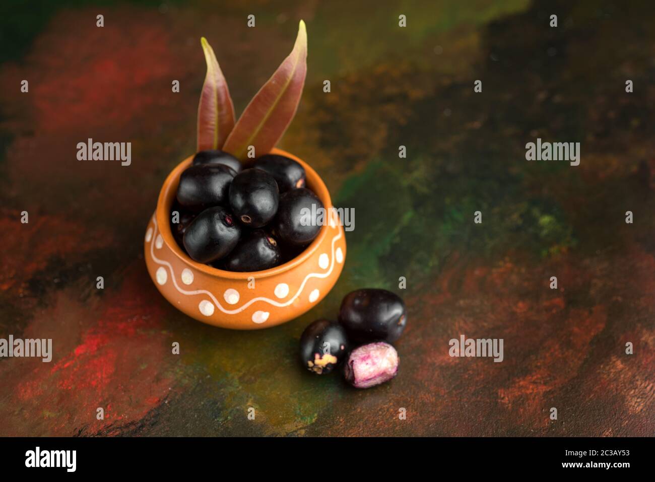 Jambolan plum or jambul or Jamun fruit, Java plum (Syzygium cumini) on ...