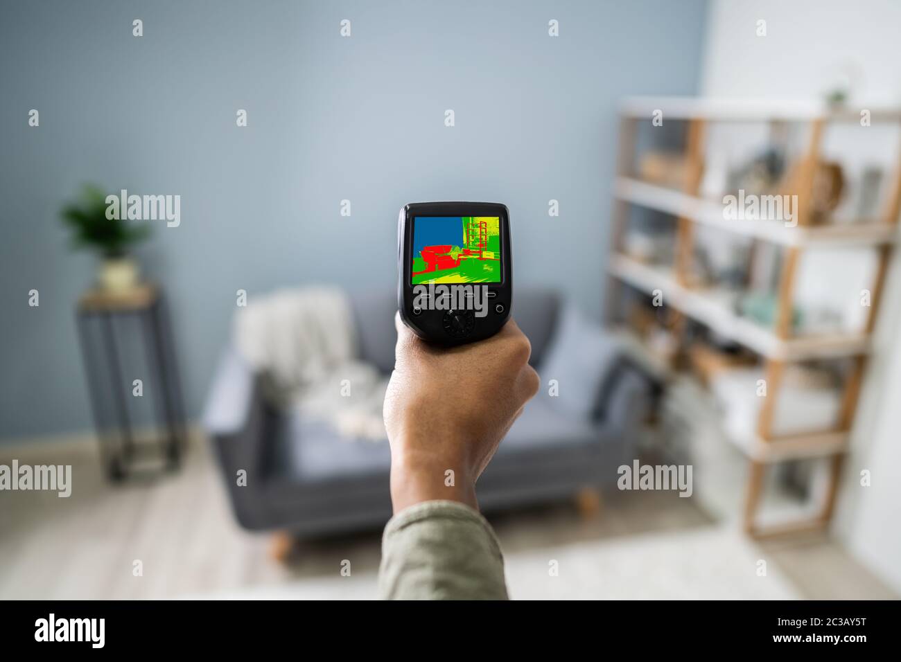 Woman's Hand Using Infrared Thermal Camera To Check Temperature In ...