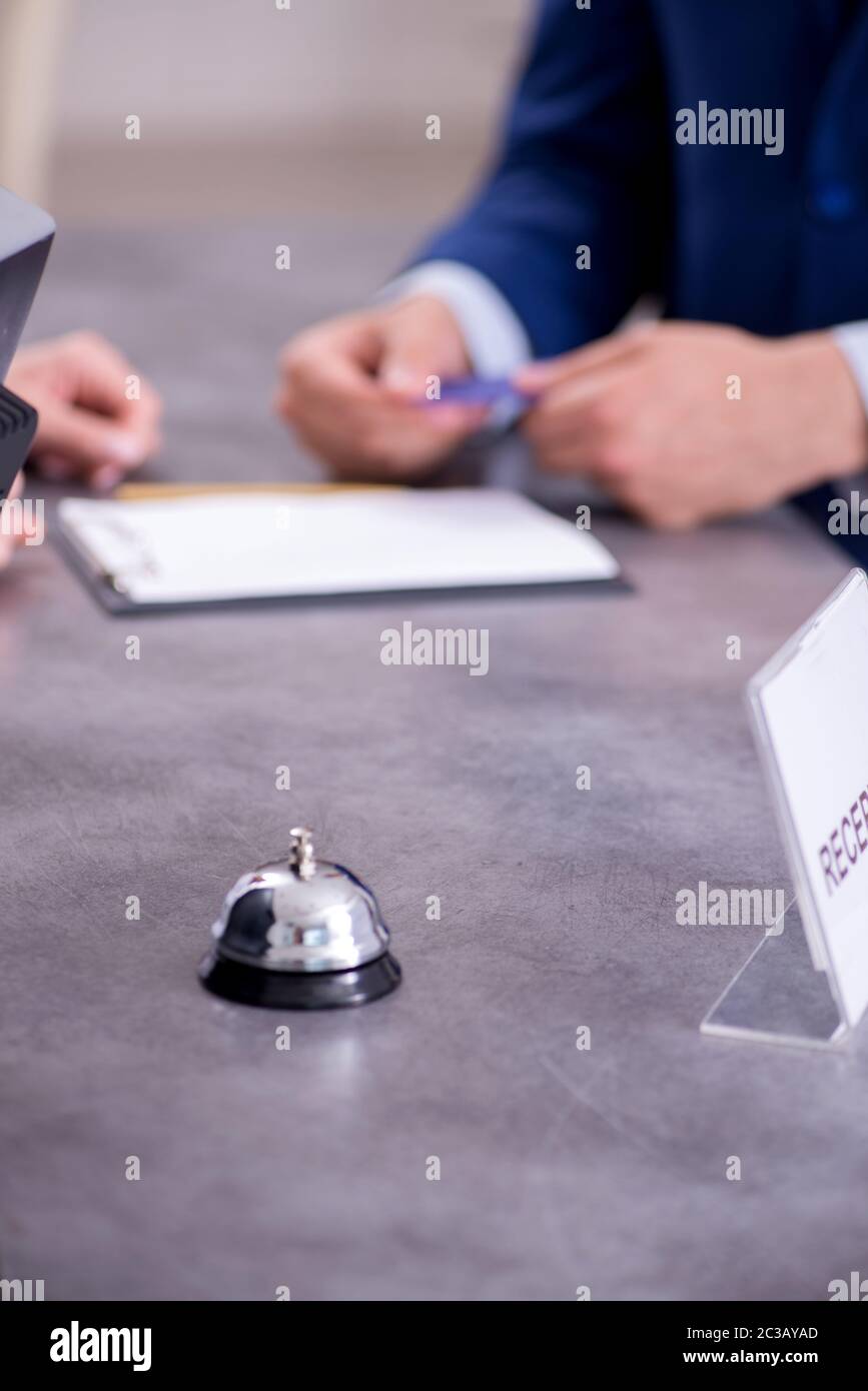 Hotel reception bell at the counter Stock Photo - Alamy
