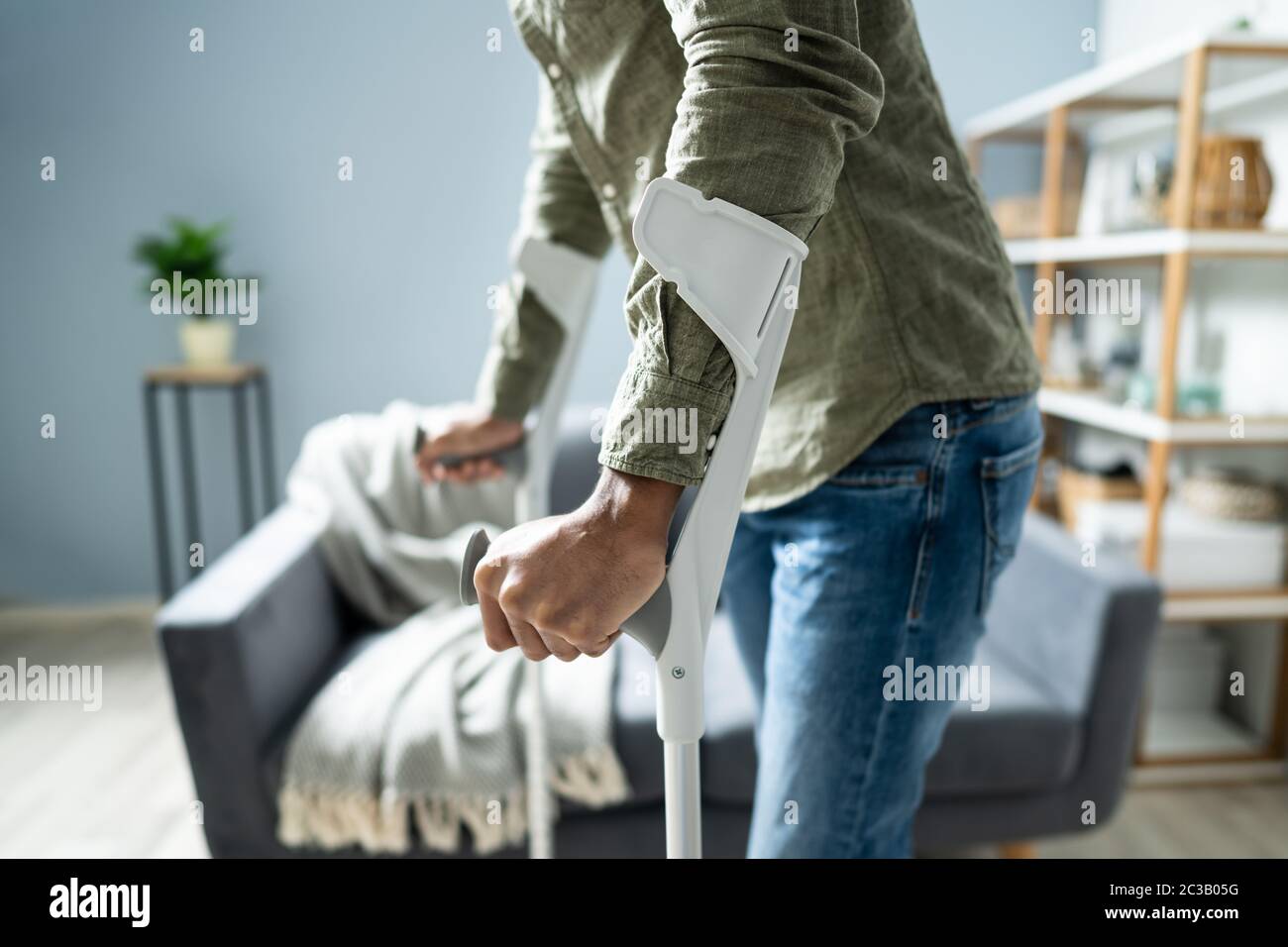 Walking patient using crutches hi-res stock photography and images - Alamy