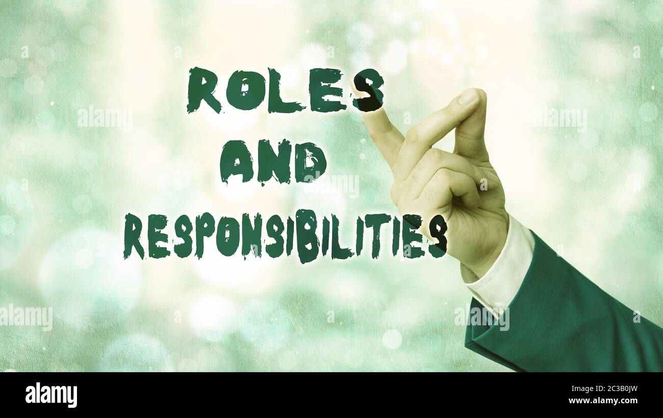Conceptual Hand Writing Showing Roles And Responsibilities Concept