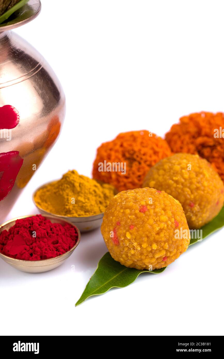 Copper Kalash with coconut, mango leaf, Haldi, kumkum and sweets with ...