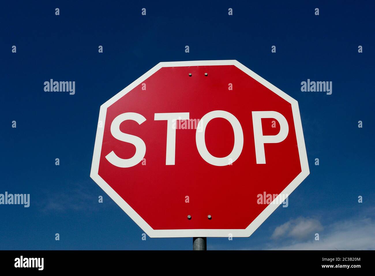 red stop sign with the sky as background Stock Photo - Alamy
