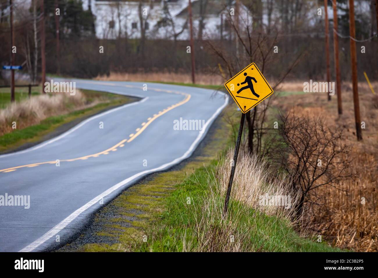 Warning Sign of People Crossing Stock Photo - Alamy