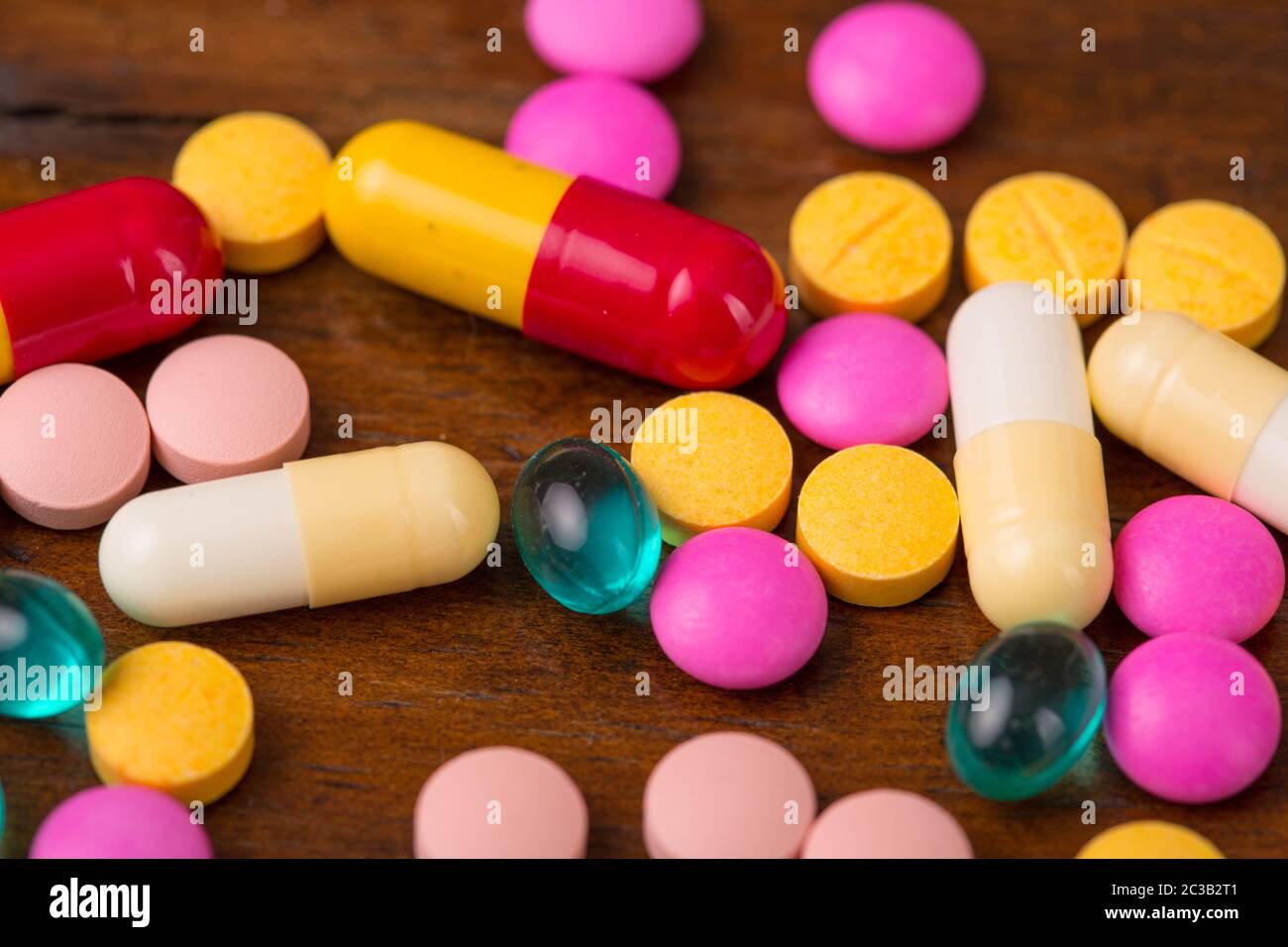 different pills heap mix therapy drugs Stock Photo - Alamy