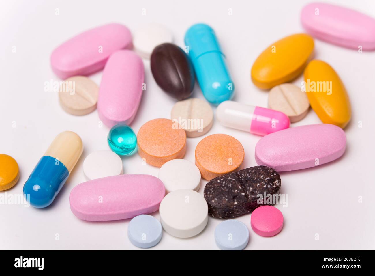 different Tablets pills capsule heap mix therapy drugs Stock Photo - Alamy