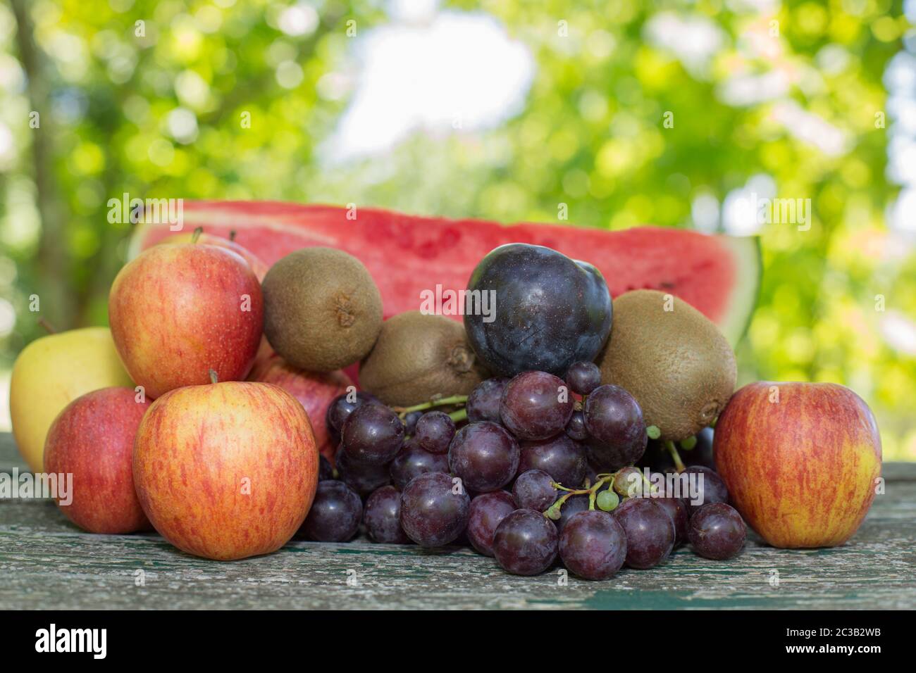 fruits in wooden table, outdoor Stock Photo - Alamy